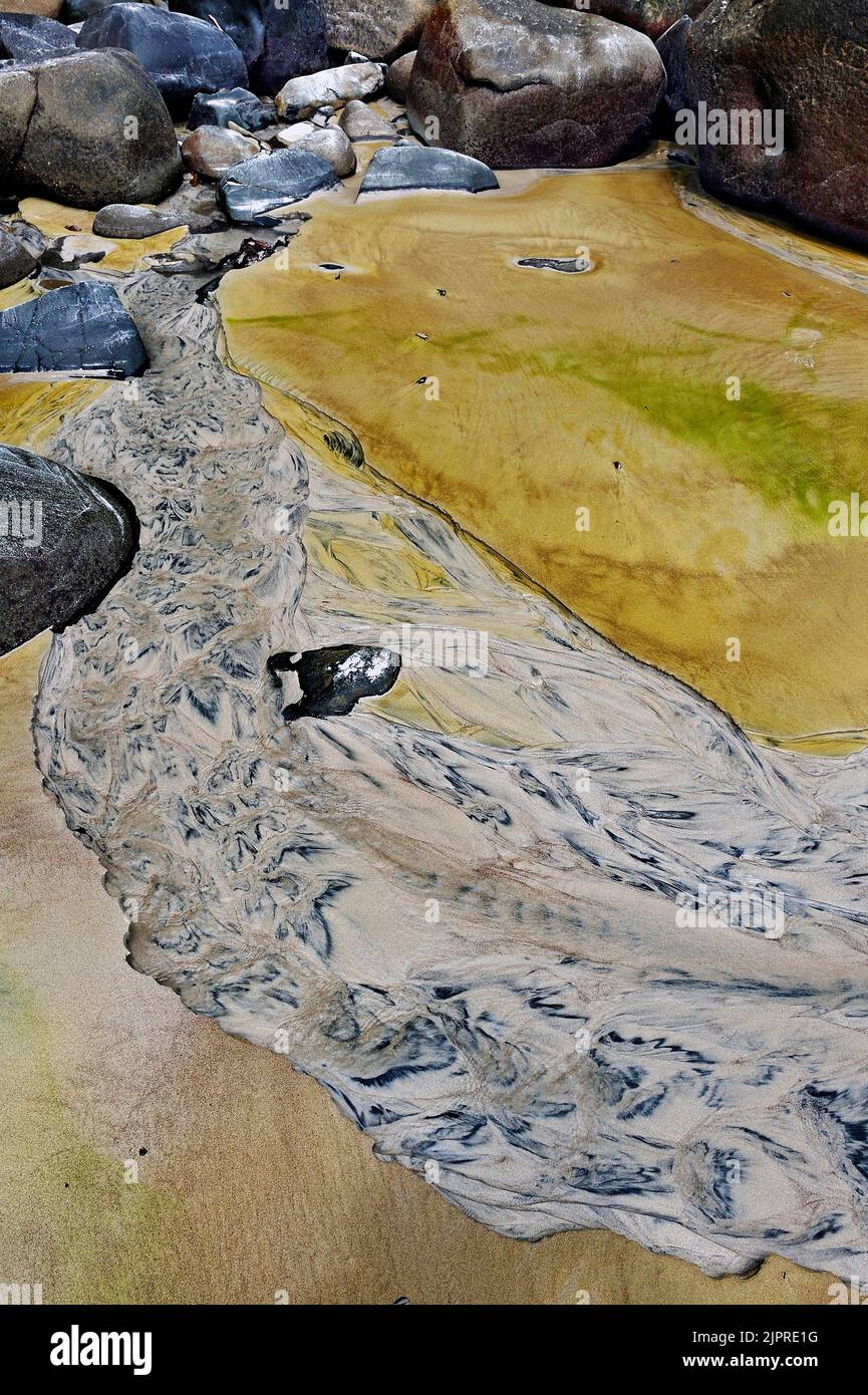 Stream inlet and coloured sand with patterns, Cocos Island, UNESCO ...