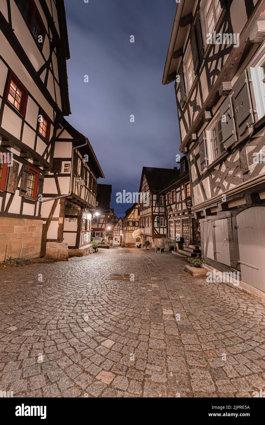 Cobbled street with historic houses at night, Sindelfingen, Germany ...