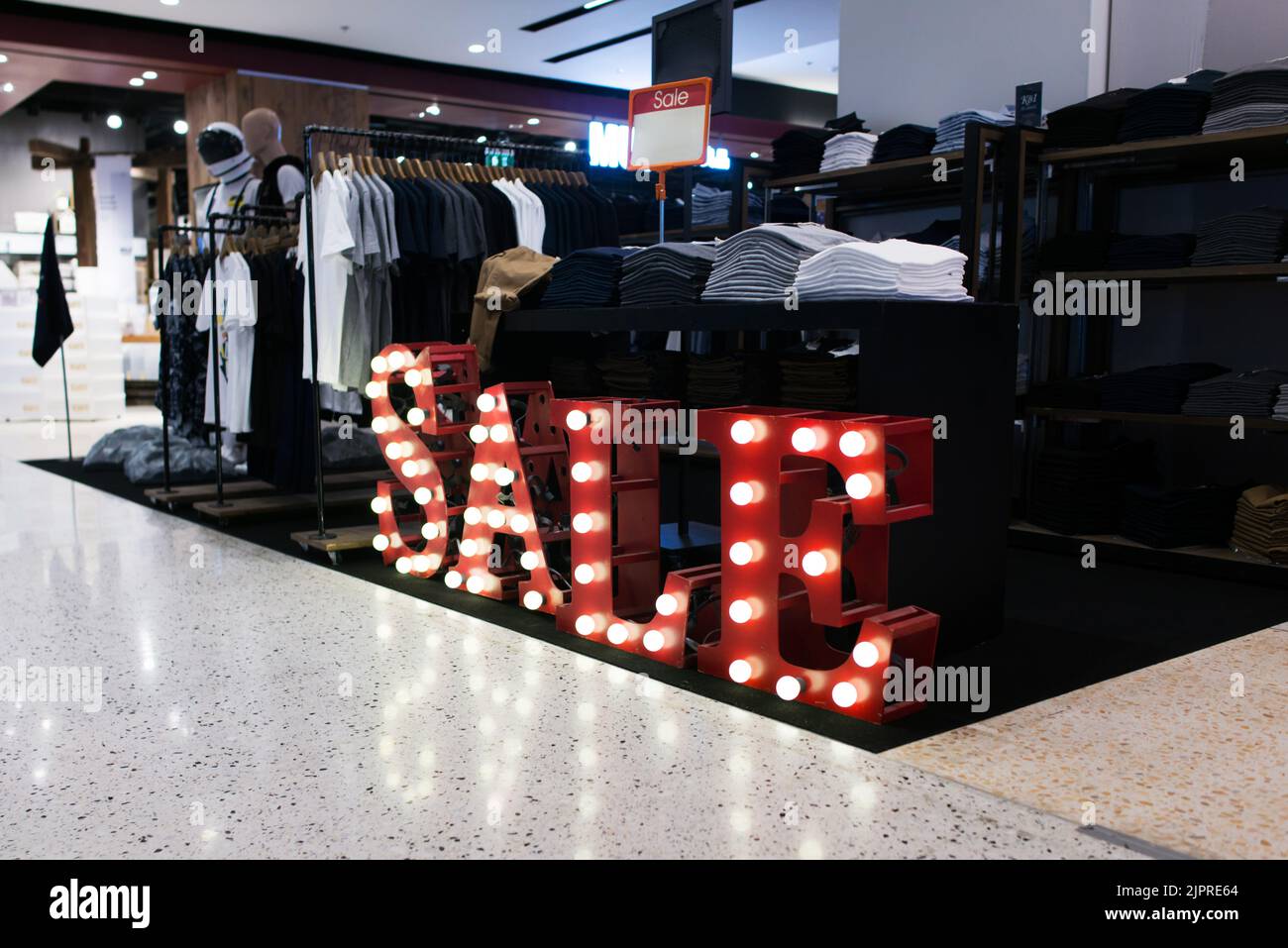 Showcases fashion boutique Clothing store in a modern shopping mall. Cloth and acessorie modern ...