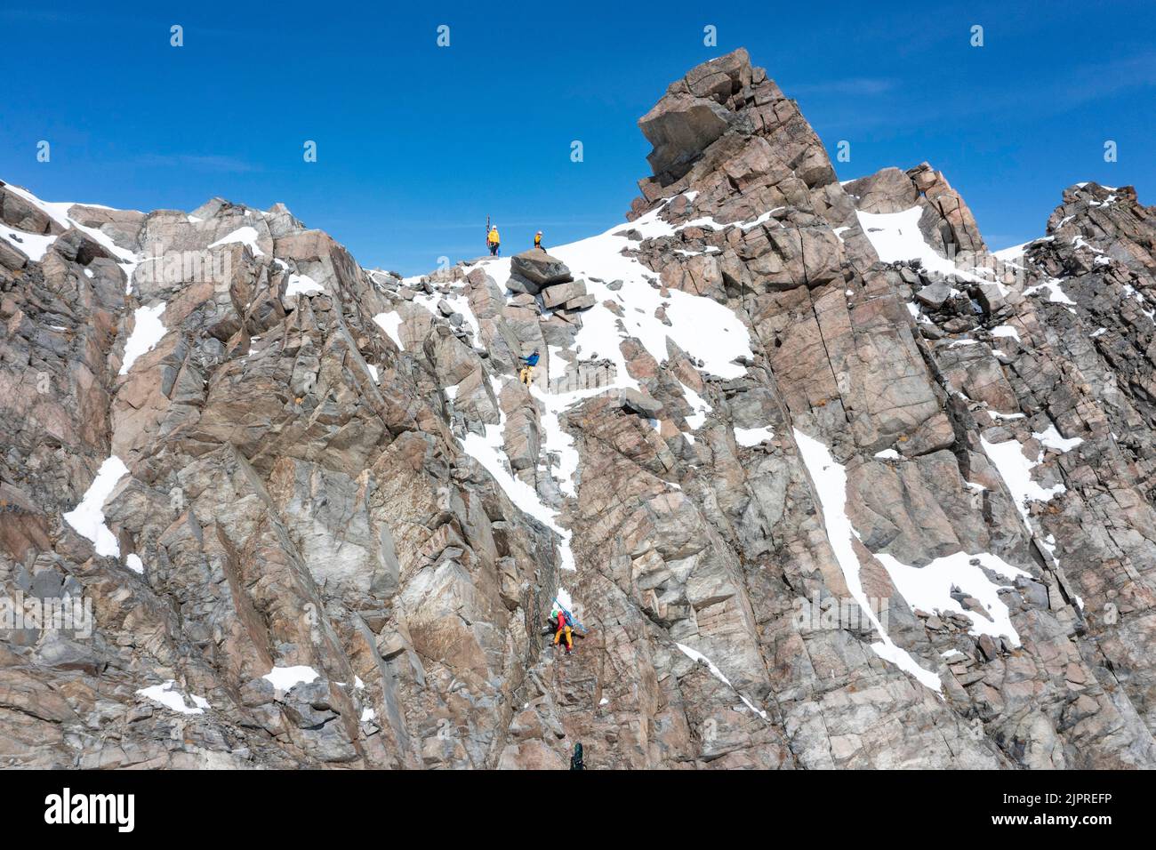 High altitude tour, ski tourers abseil down a cliff, Stubai, Tyrol ...