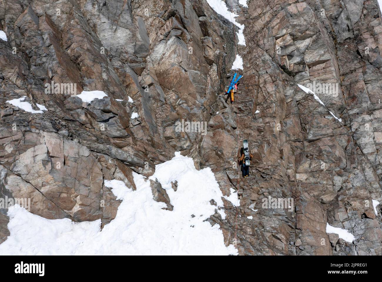 High altitude tour, ski tourers abseil down a cliff, Stubai, Tyrol ...