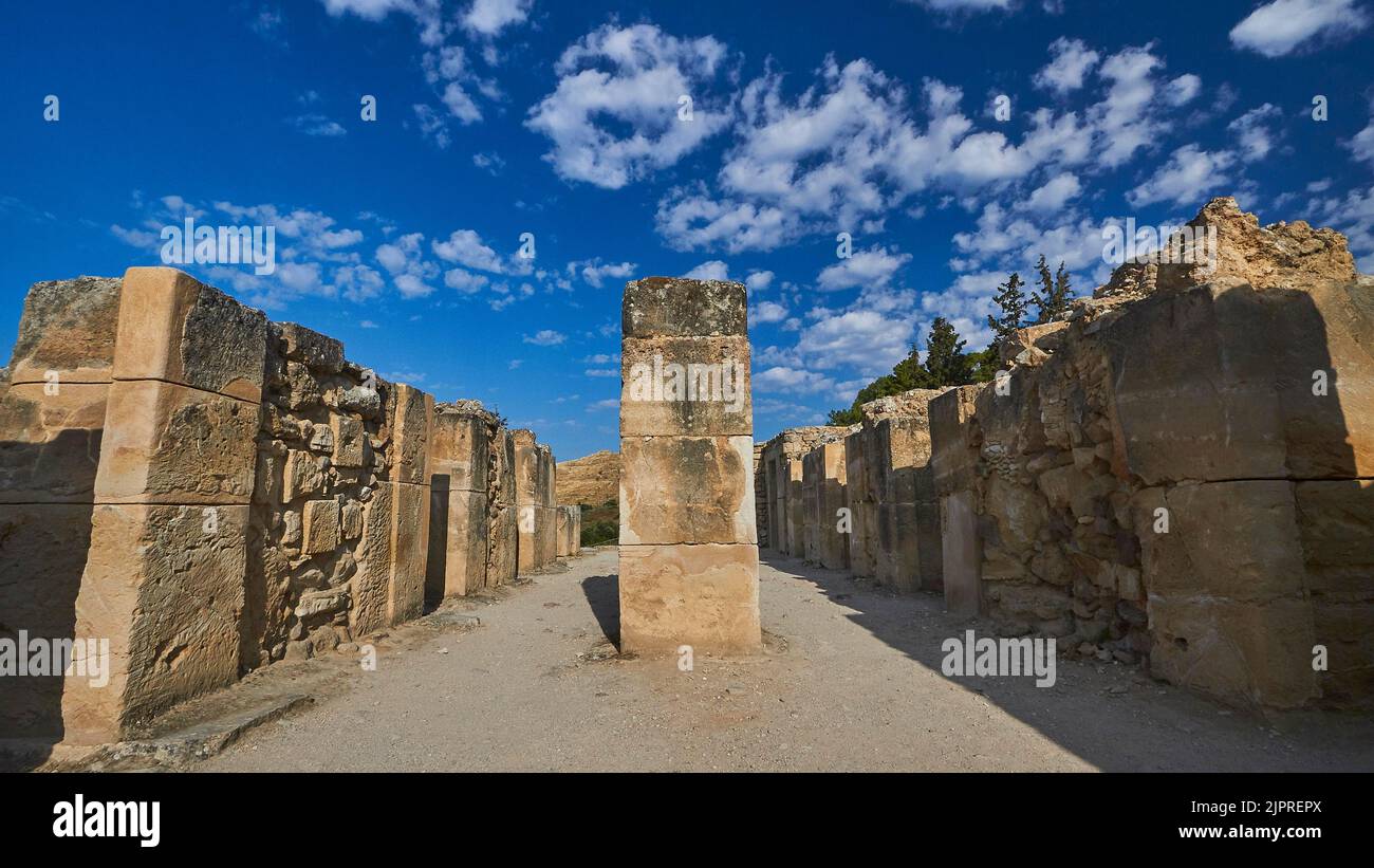 Morning light, wide angle, alley of buildings, stone column rectangular ...