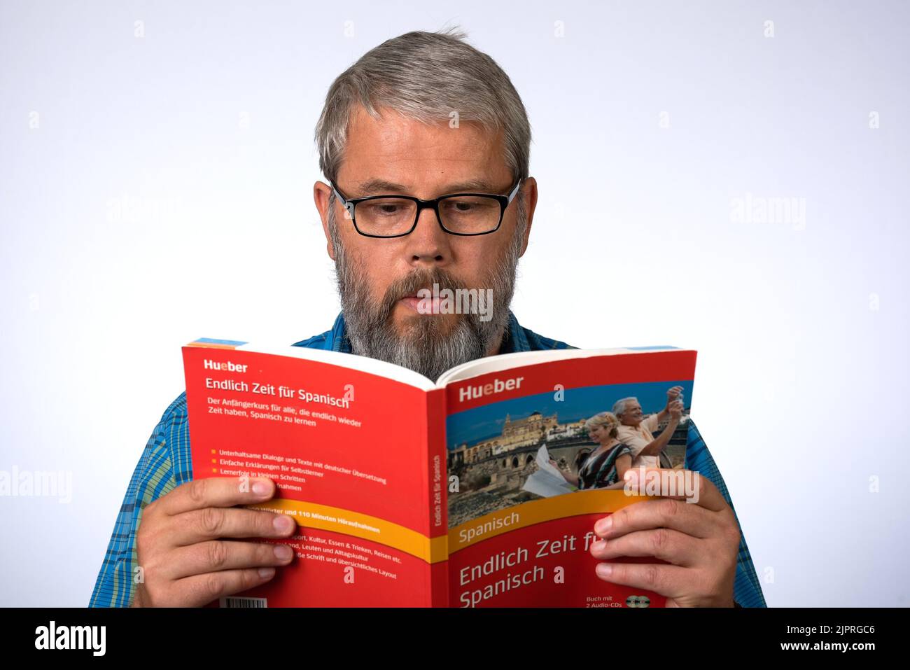 Man, 55 years in studio, symbol image learning, learning a language ...