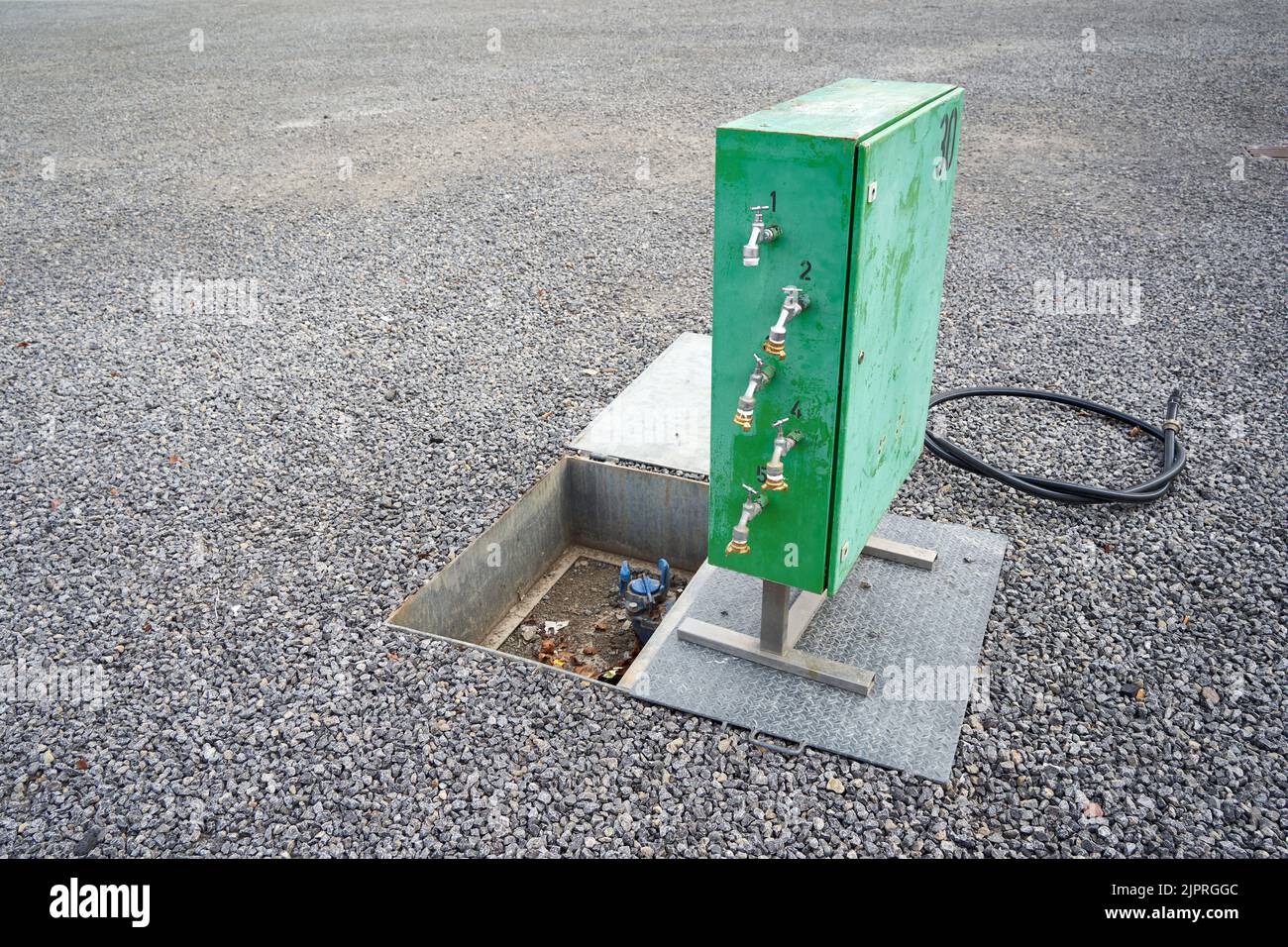 Water distribution station for the large construction site. Green ...