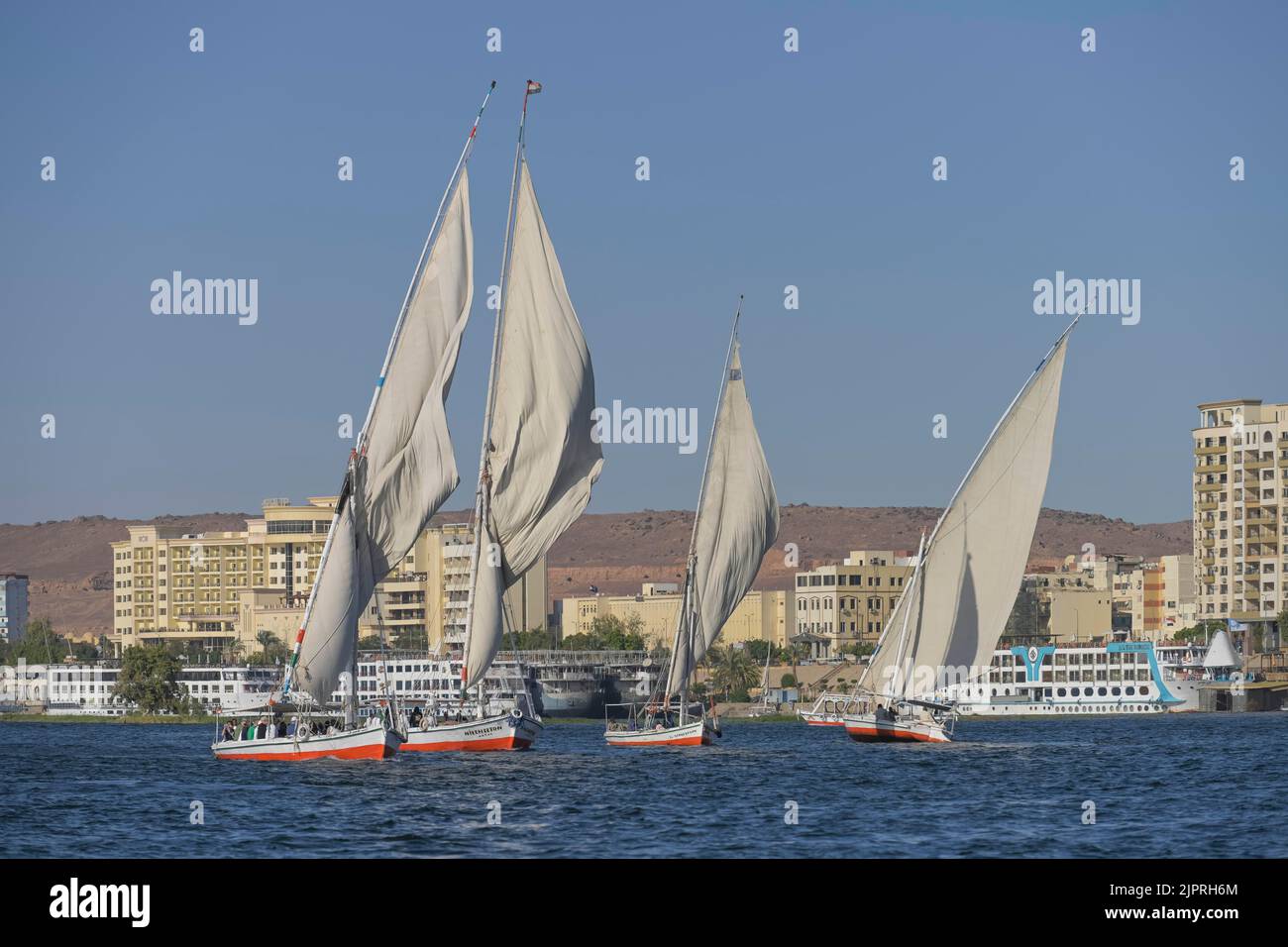 Sailing boats, excursion boats on the Nile at Aswan, Egypt Stock Photo ...