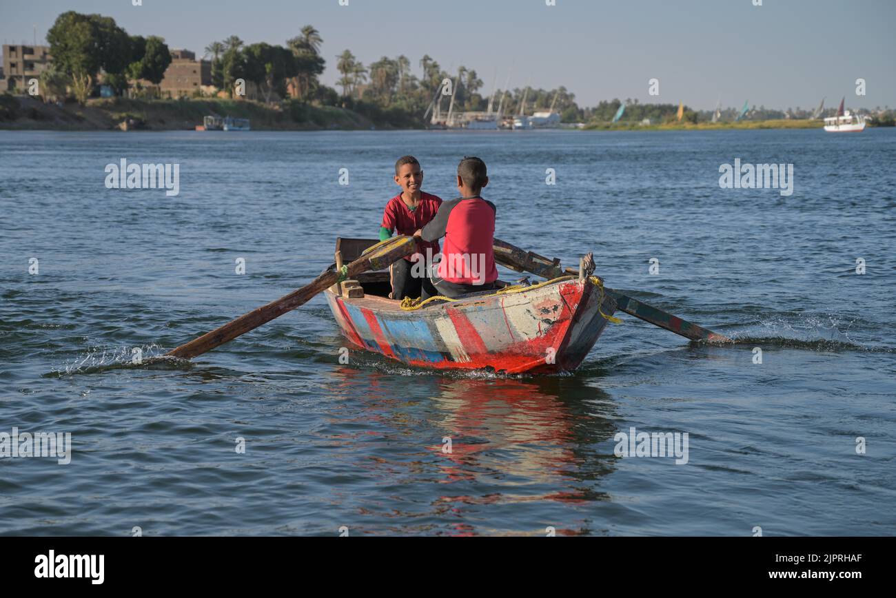 Child rowing boat hi-res stock photography and images - Alamy