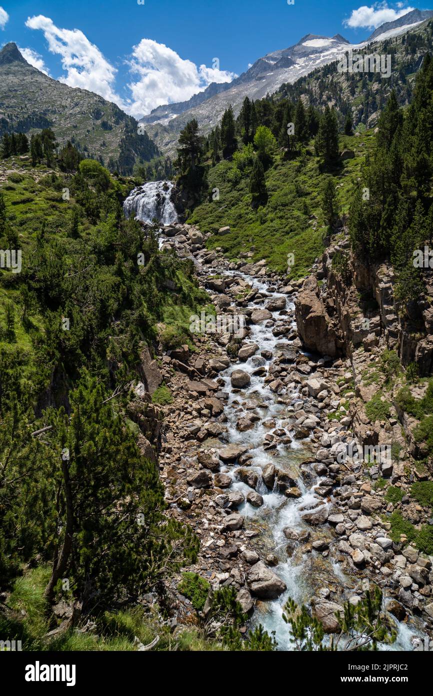 Spectacular vertical view river with large stones coming down from a ...