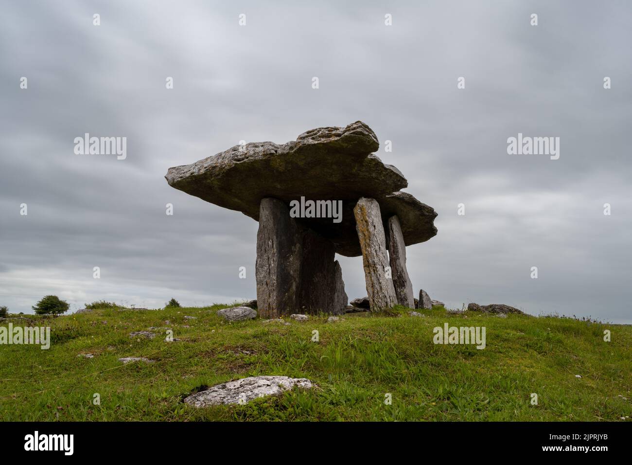 A long exposure view of the Poulnabrone Dolmen under an overcast sky in ...