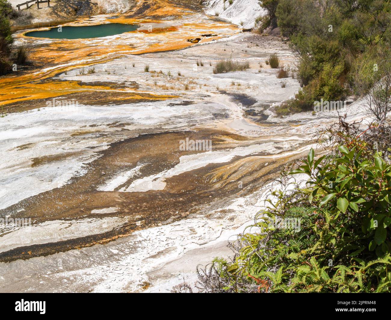 Bright sulfuric coloured land in yellow and brown patterned landscape ...