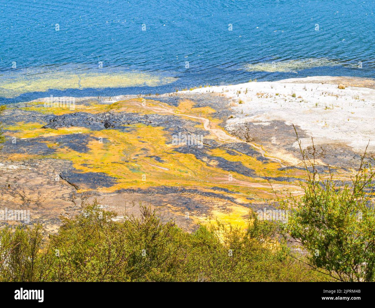 Bright sulfuric coloured land in yellow and brown patterned landscape ...