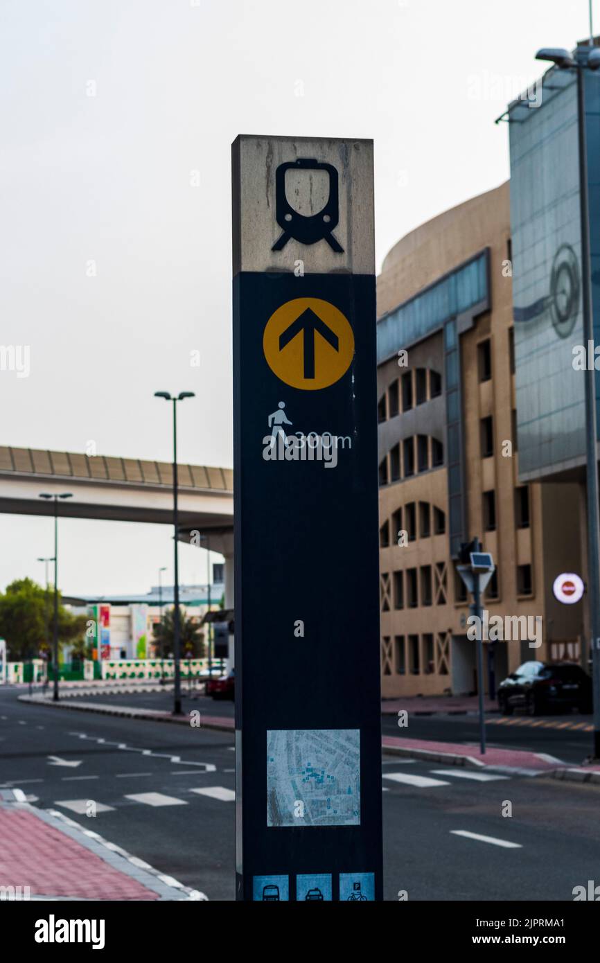 Shot of a train station signboard in the city's street Stock Photo - Alamy