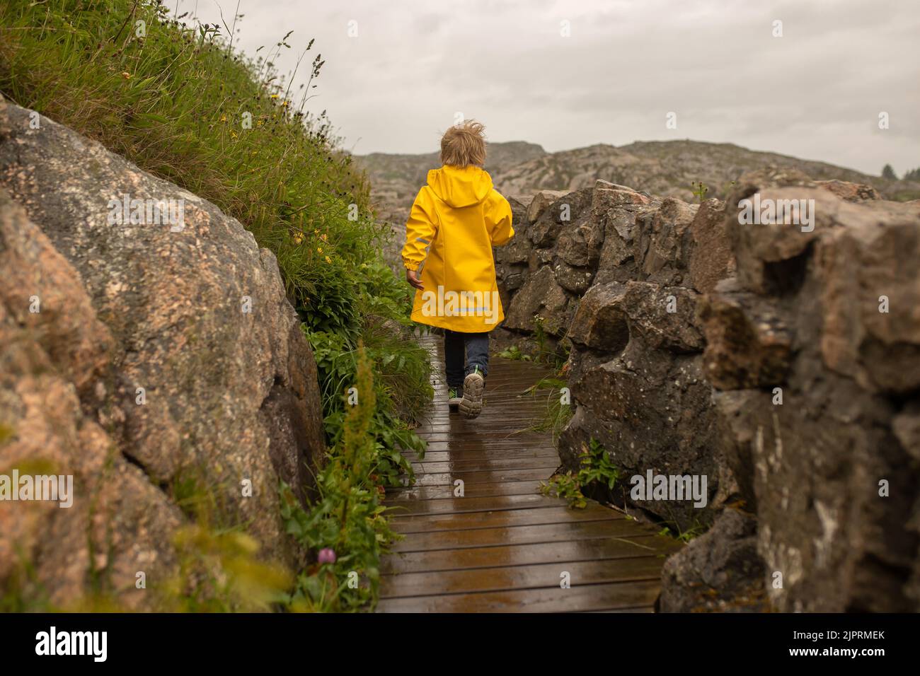 Family with children, visiting the Lindesnes Fyr Lighthouse in Norway ...