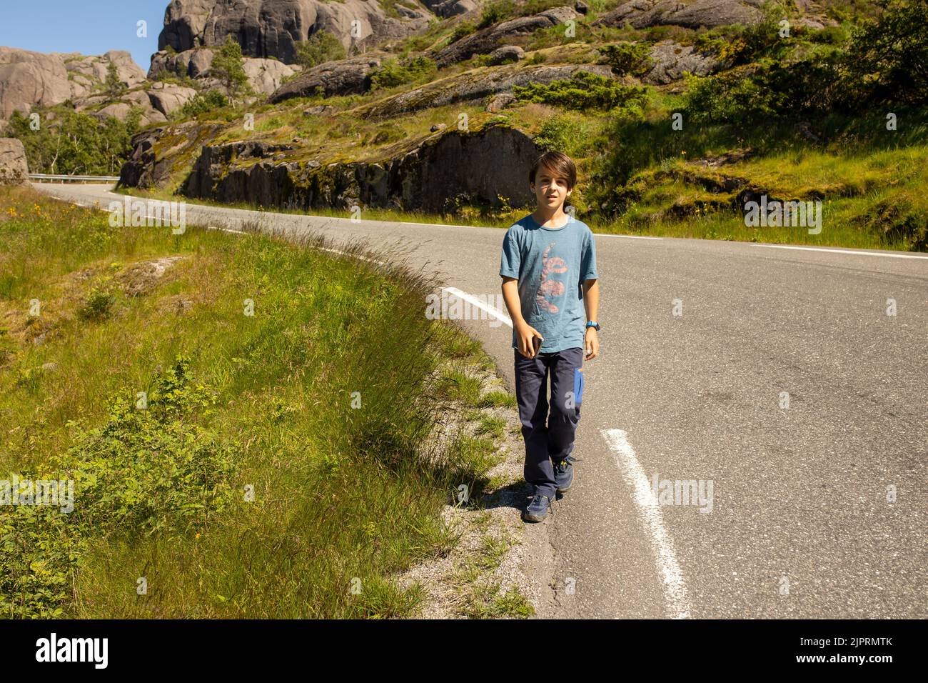 Happy people, enjoying amazing views in South Norway coastline, fjords ...