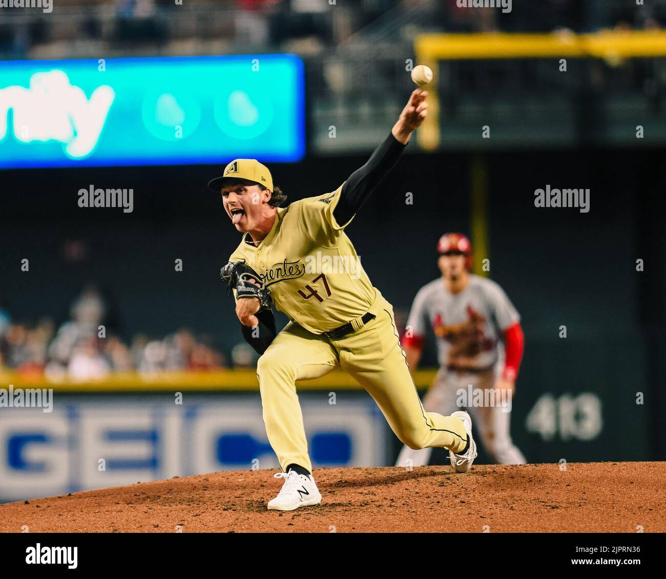 Arizona Diamondbacks pitcher Tommy Henry (47) throws against the St ...