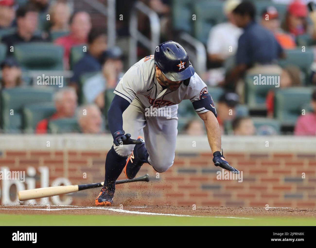 Atlanta, GA. USA; Houston Astros second baseman Jose Altuve (27) trips ...