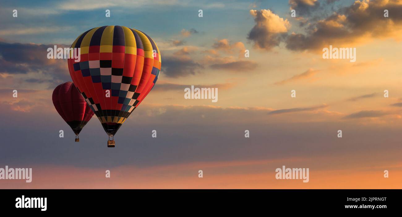 Colorful hot air balloons flying on the sunset sky background Stock ...