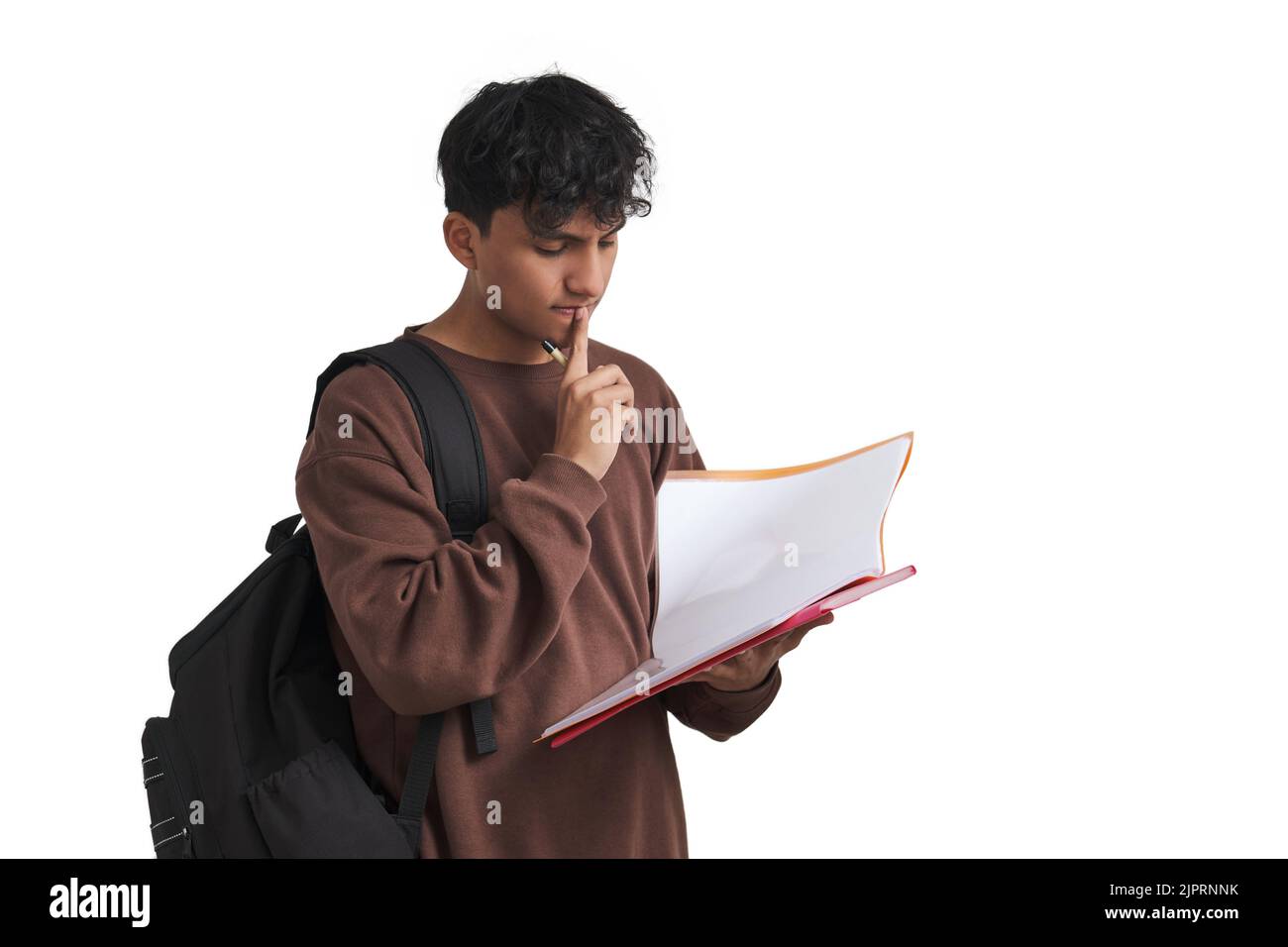 Young peruvian student reviewing class notes, isolated Stock Photo - Alamy