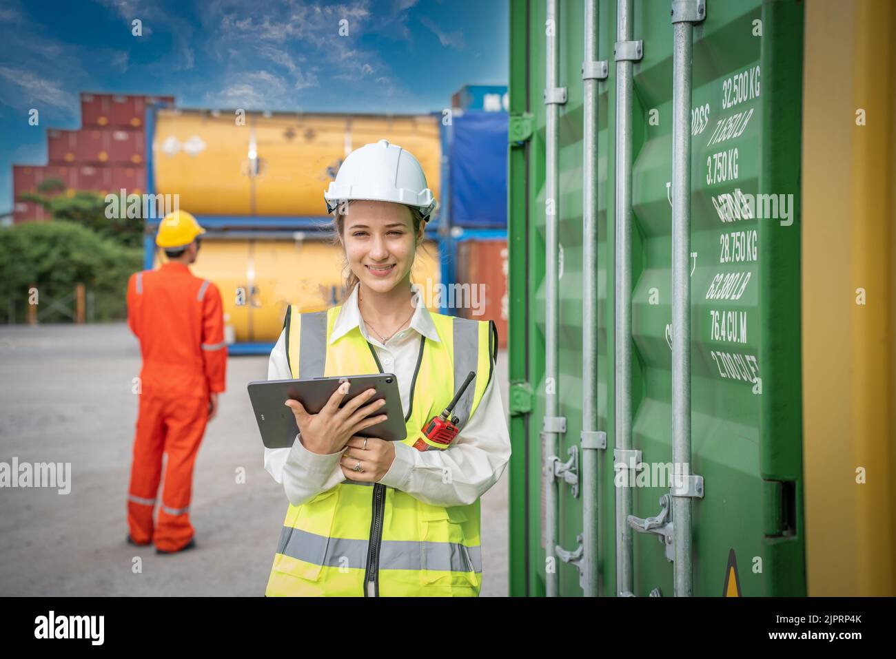 Woman inspector Manager Checking Cargo in Container cargo ...