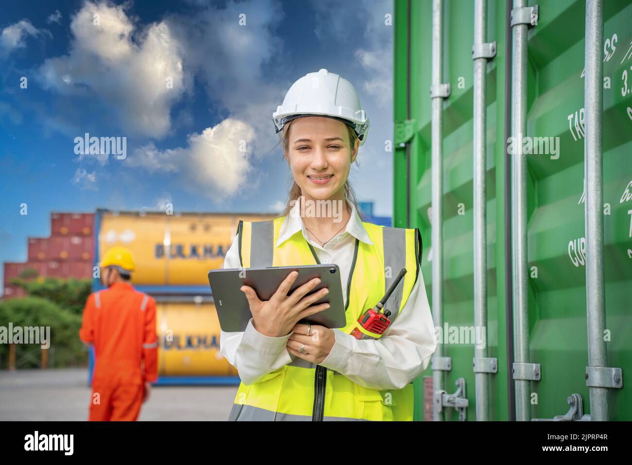 Woman inspector Manager Checking Cargo in Container cargo ...