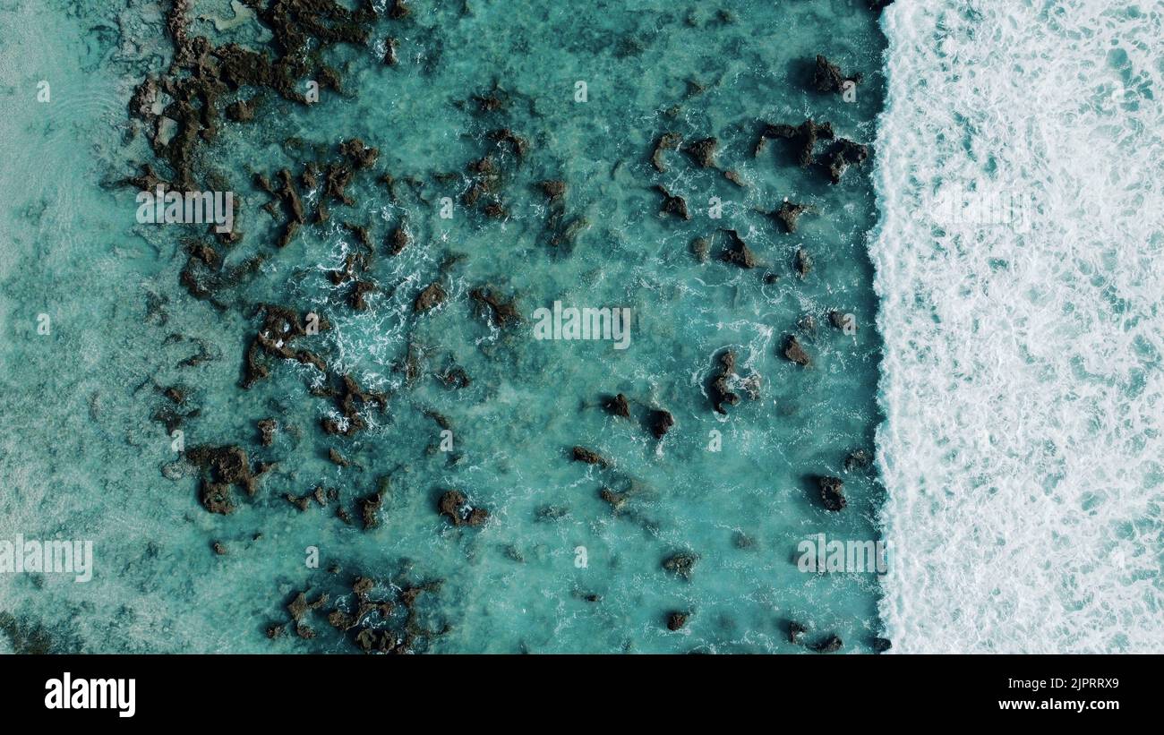 A top view shot of the clear blue water of a sea during the day Stock ...