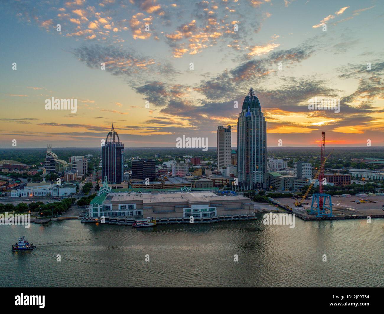 The downtown Mobile, Alabama waterfront skyline at sunset Stock Photo ...