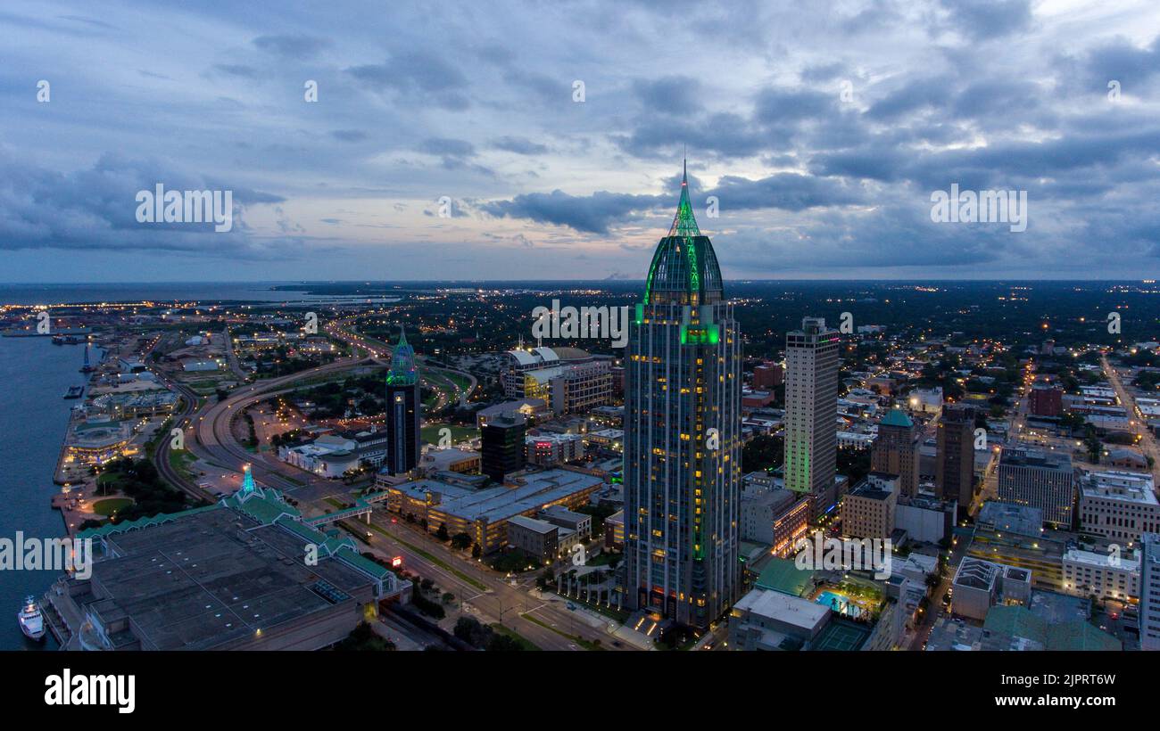The downtown Mobile, Alabama waterfront skyline at sunset Stock Photo ...