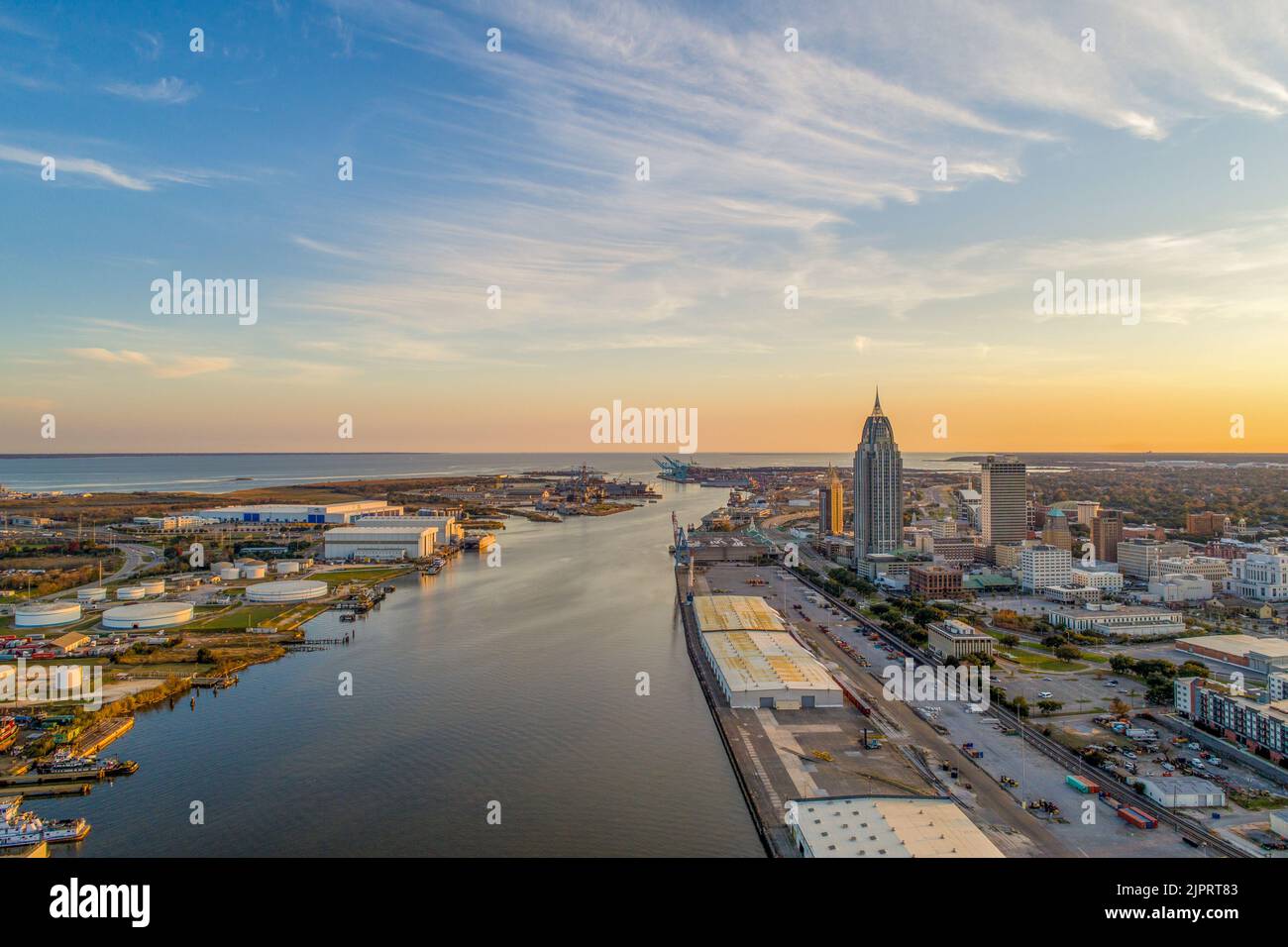 The downtown Mobile, Alabama waterfront skyline at sunset Stock Photo ...