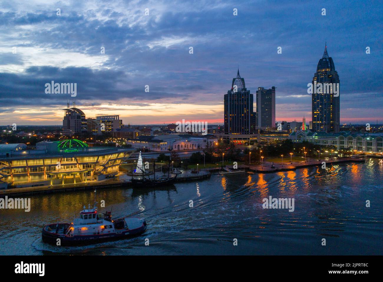 The downtown Mobile, Alabama waterfront skyline at sunset Stock Photo ...