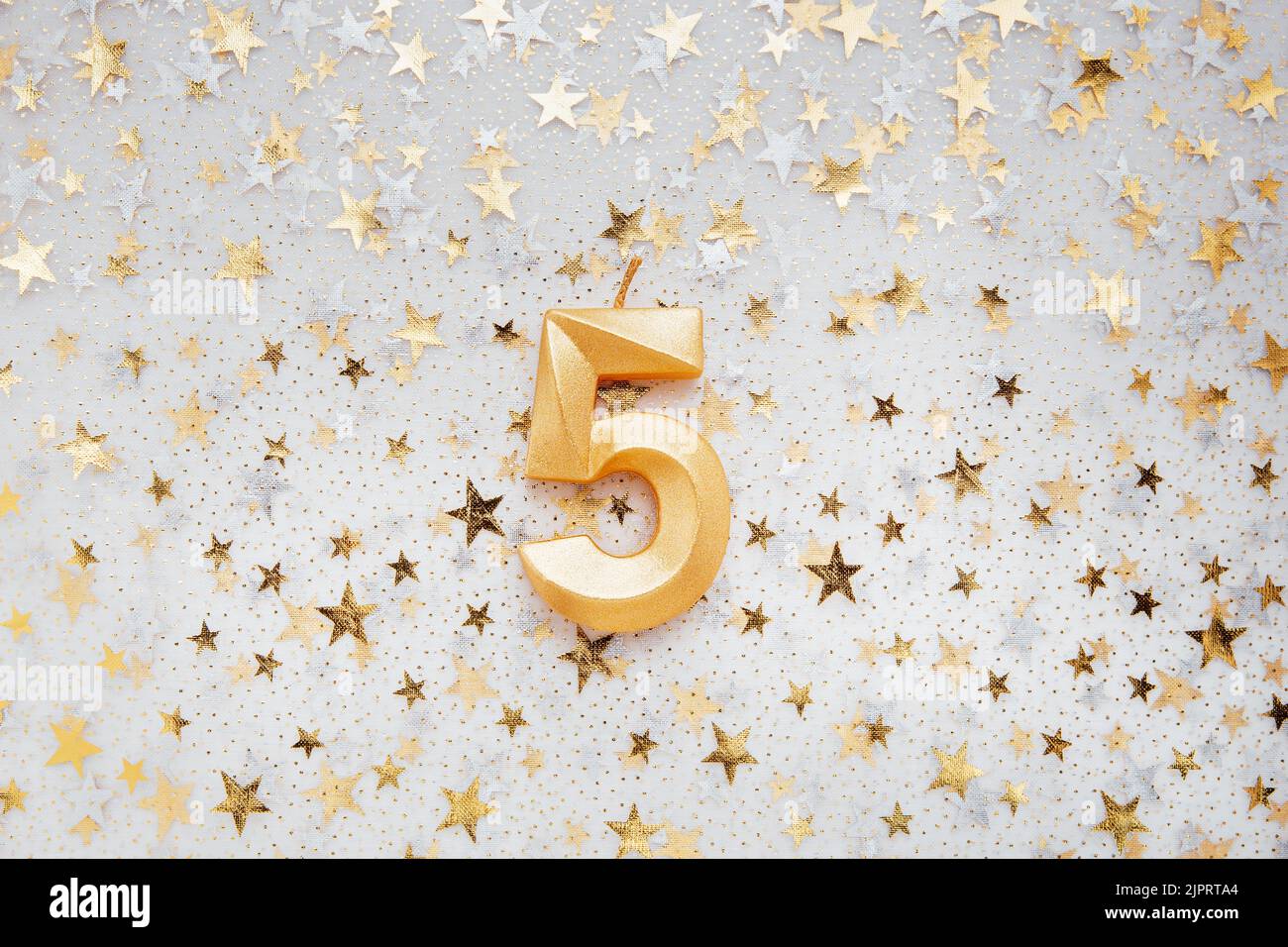 Number five 5 golden celebration birthday candle on Festive Background ...