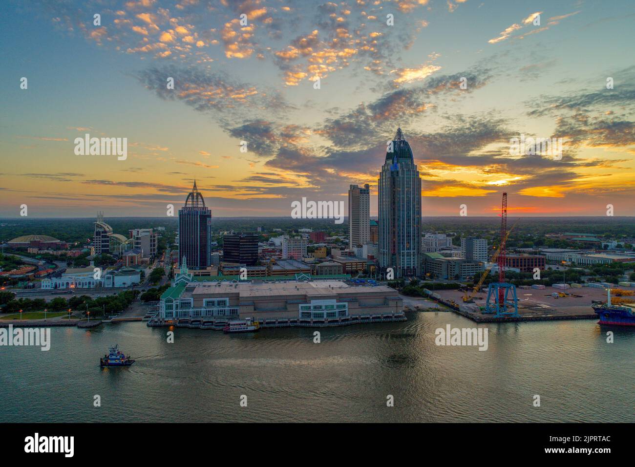 The downtown Mobile, Alabama waterfront skyline at sunset Stock Photo ...