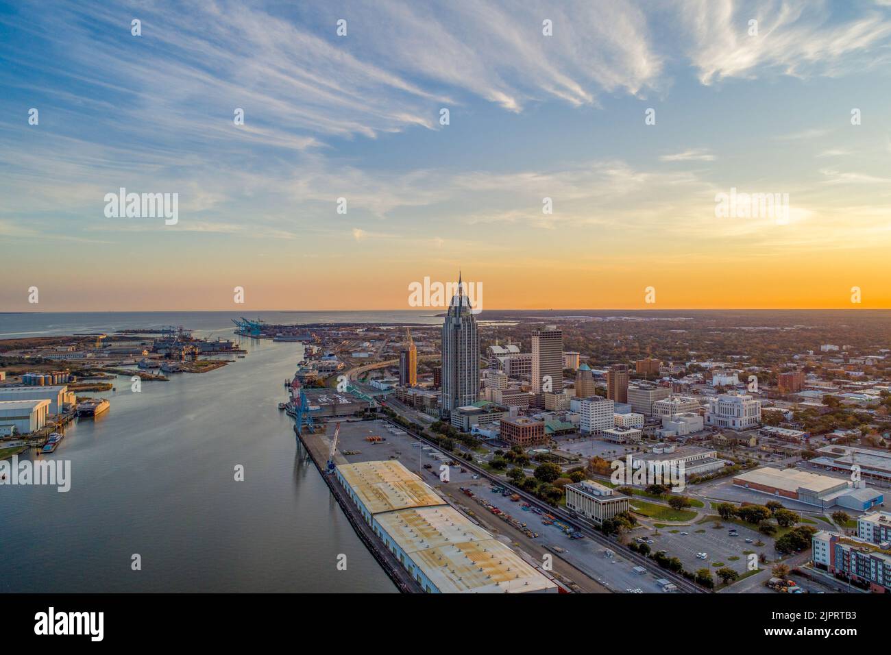 The downtown Mobile, Alabama waterfront skyline at sunset Stock Photo ...