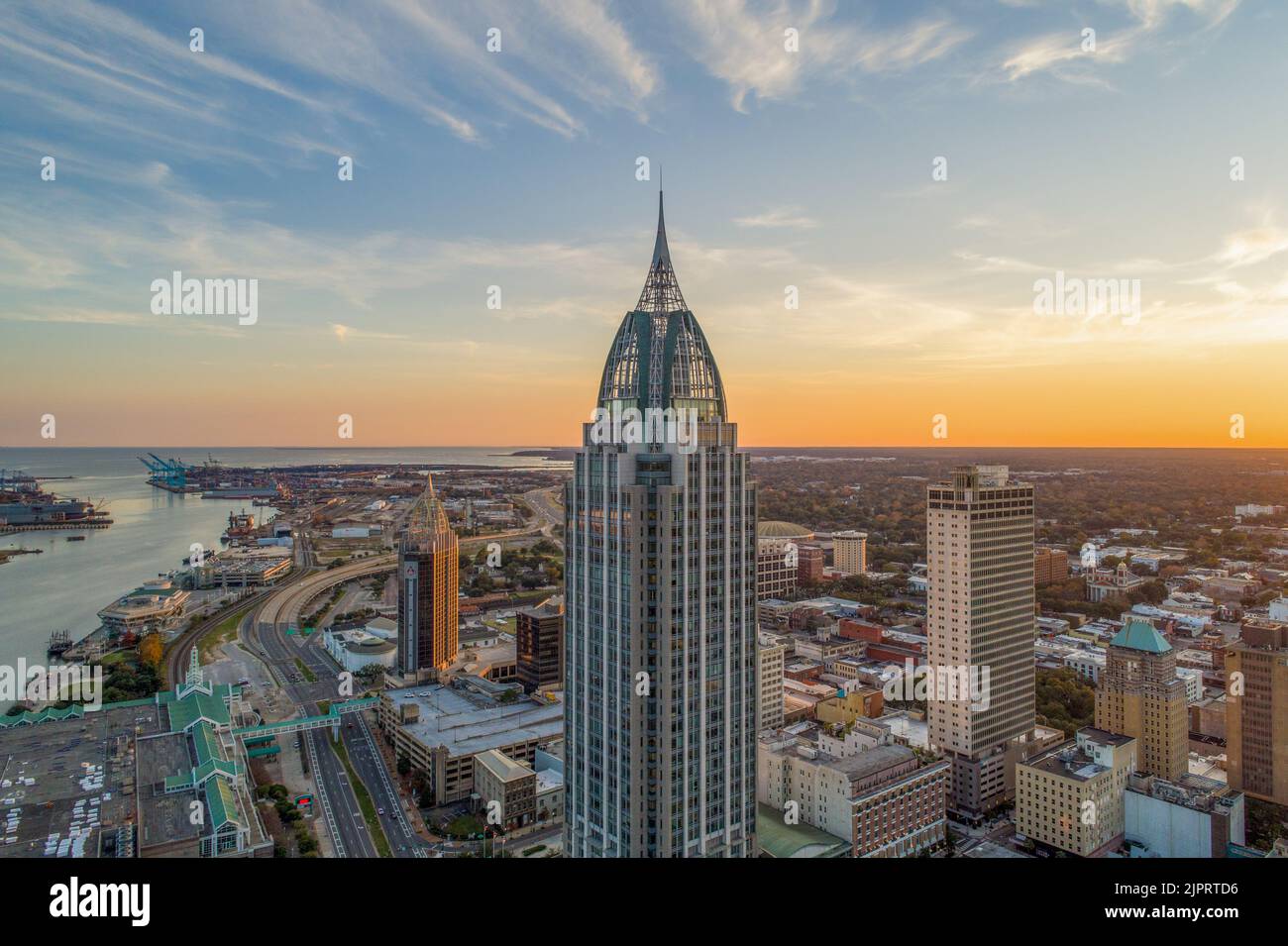 The downtown Mobile, Alabama waterfront skyline at sunset Stock Photo ...