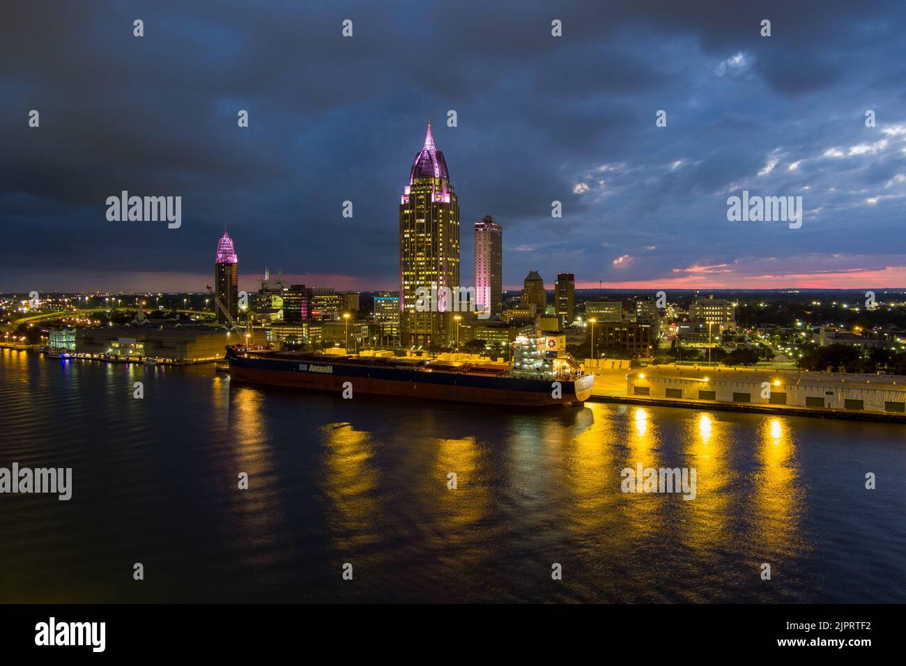 The downtown Mobile, Alabama waterfront skyline at sunset Stock Photo ...