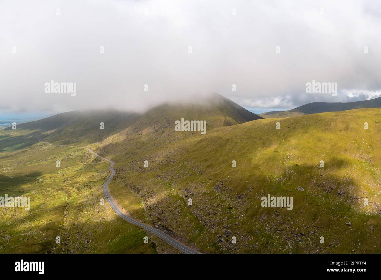 the steep and winding mountain road leading to the top of Connor Pass ...