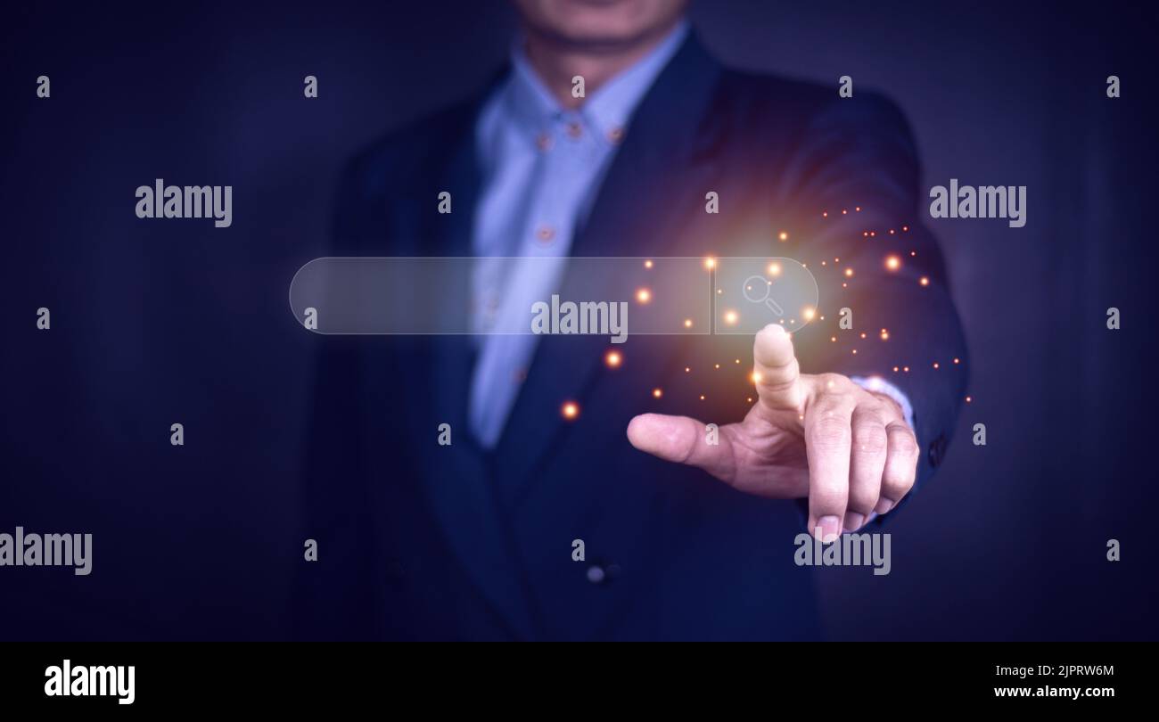 Data Search Technology Search Engine Optimization. man's hands are using a computer notebook to ...