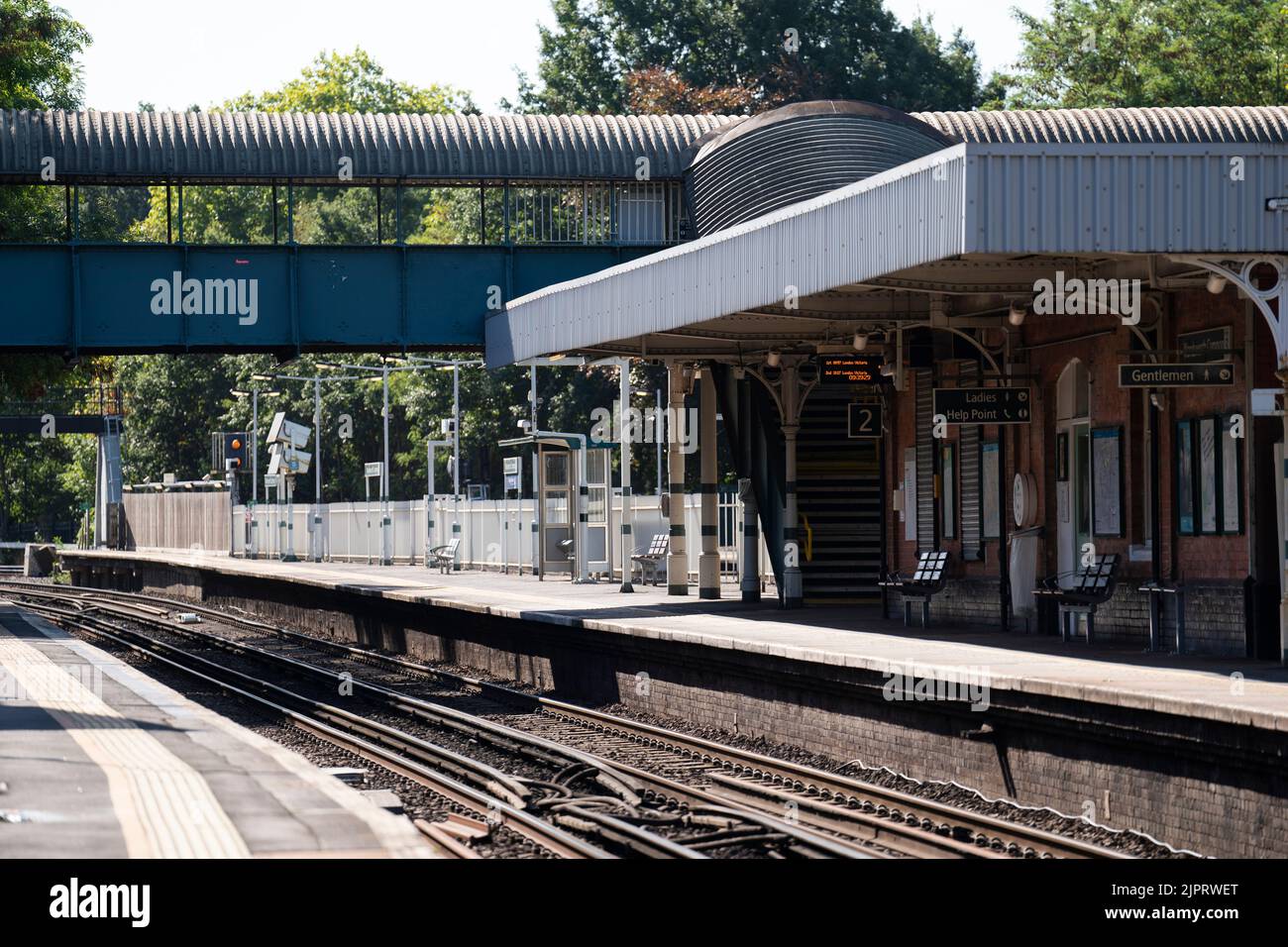Empty platforms at Wandsworth Common Station in south London. Rail ...