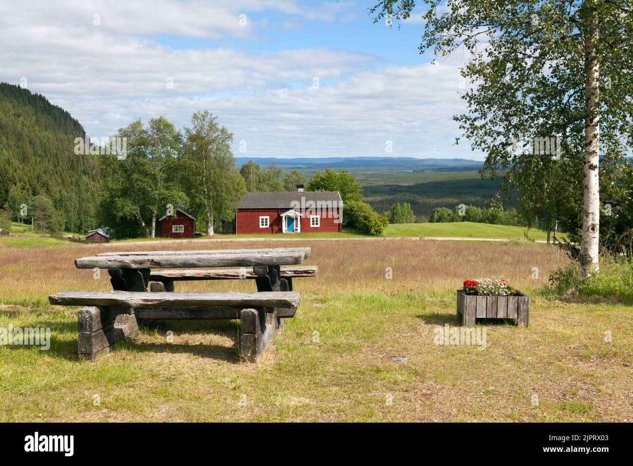 RURAL COUNTY, SWEDEN ON JULY 07, 2016. View of wooden seats and the ...