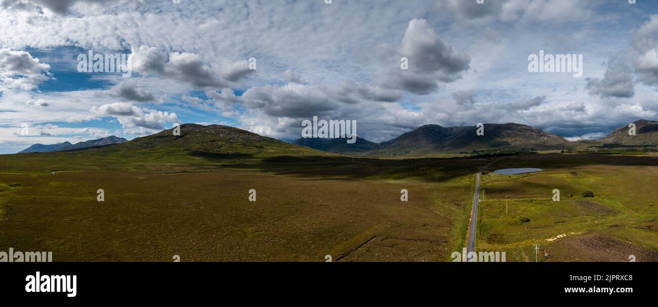 drone panorama landscape of Connemara National Park and the Twelve Bens ...