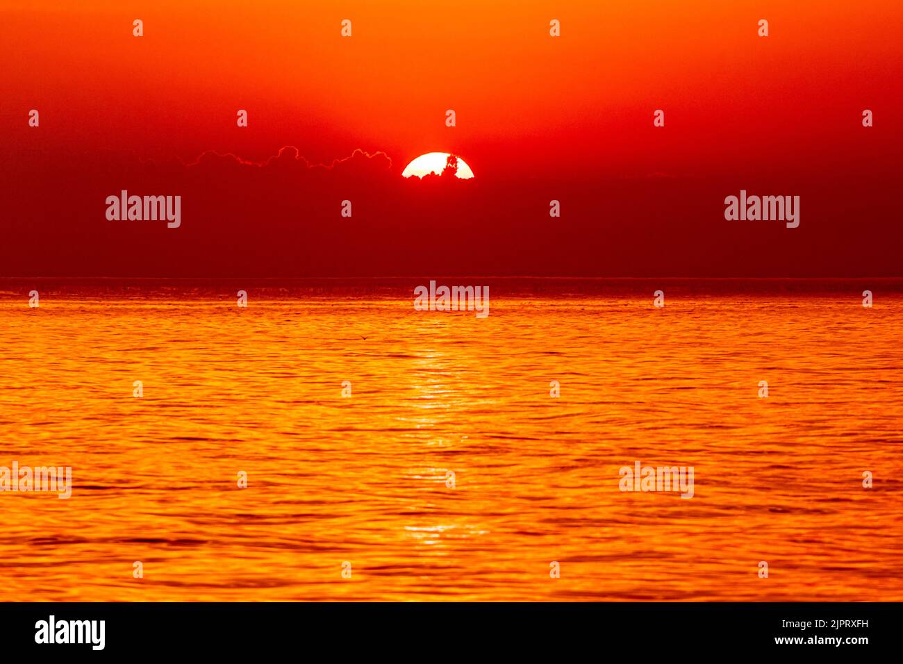 Sunset and sunrice Stock Photo - Alamy