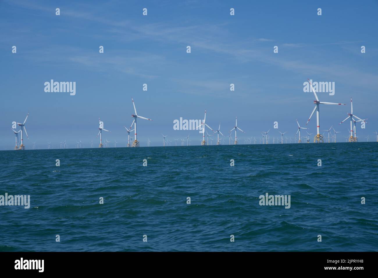 The offshore wind farm with wind turbines in the north sea, Atlantic ...