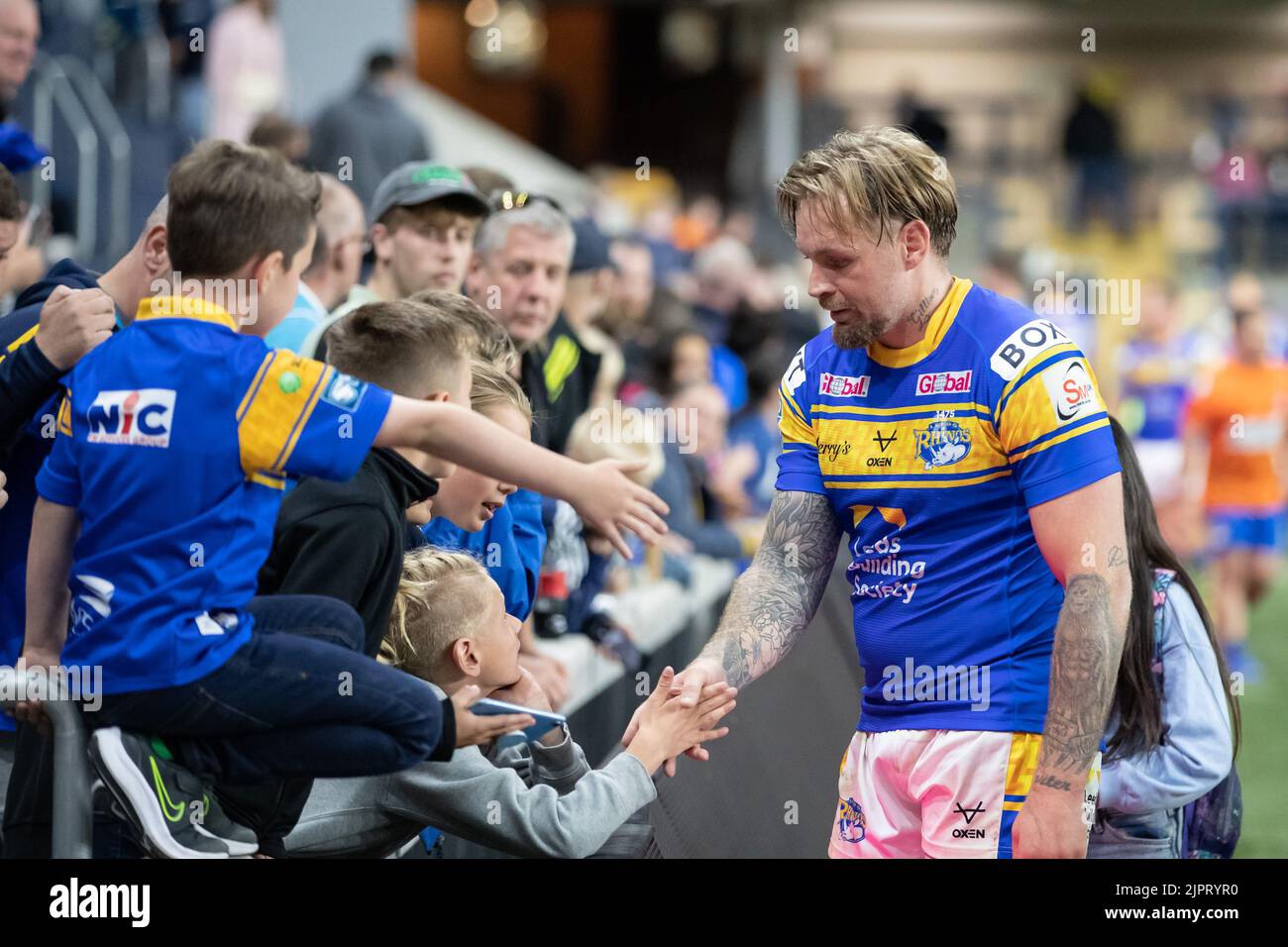 Blake Austin #6 of Leeds Rhinos meets with the supporters after the ...