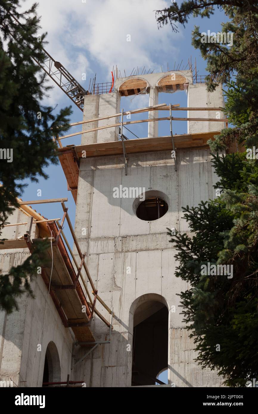 Reconstruction of church tower damaged in earthquake Stock Photo - Alamy