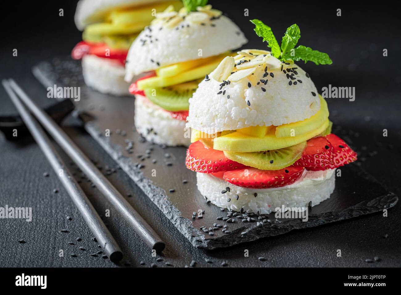 Tasty and unique sushi burger with strawberries and mascarpone as ...