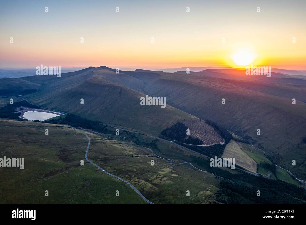 Sunrise over Lakes and Mountains from a drone, Pen y Fan, Cribyn ...