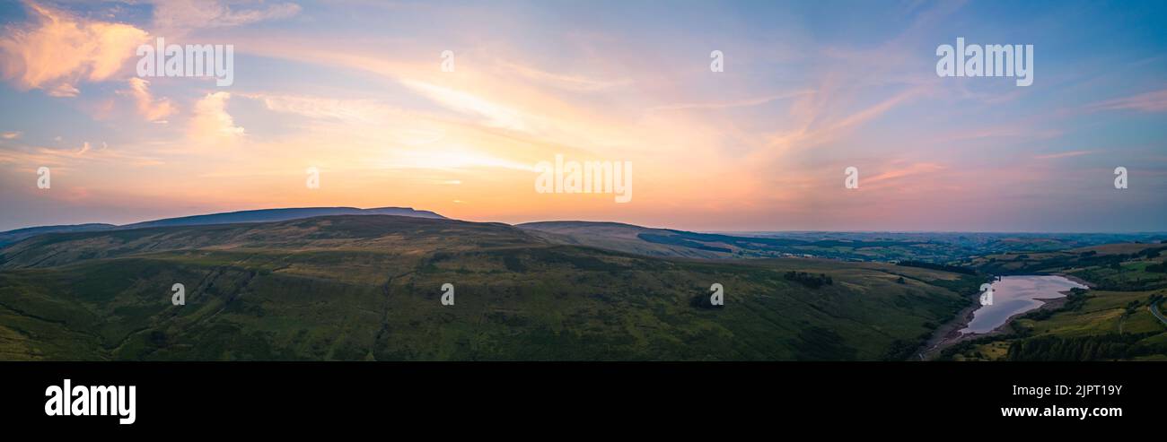 Sunset over Cray Reservoir from a drone, Brecon Beacons, Wales, England ...