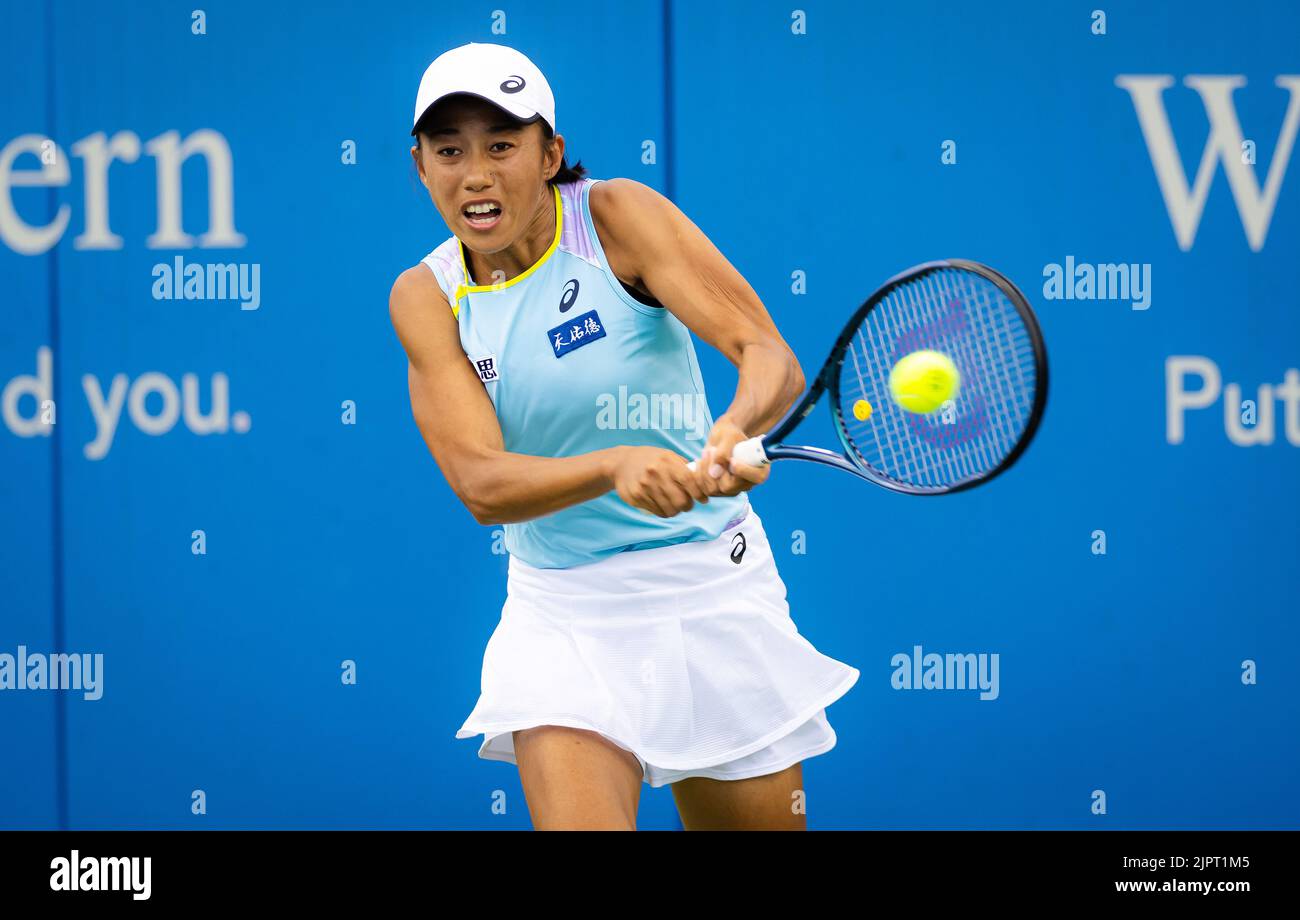 Shuai Zhang of China in action against Anett Kontaveit of Estonia ...