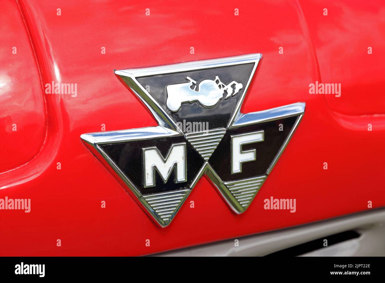 Badge on red Massey Ferguson tractor Stock Photo - Alamy