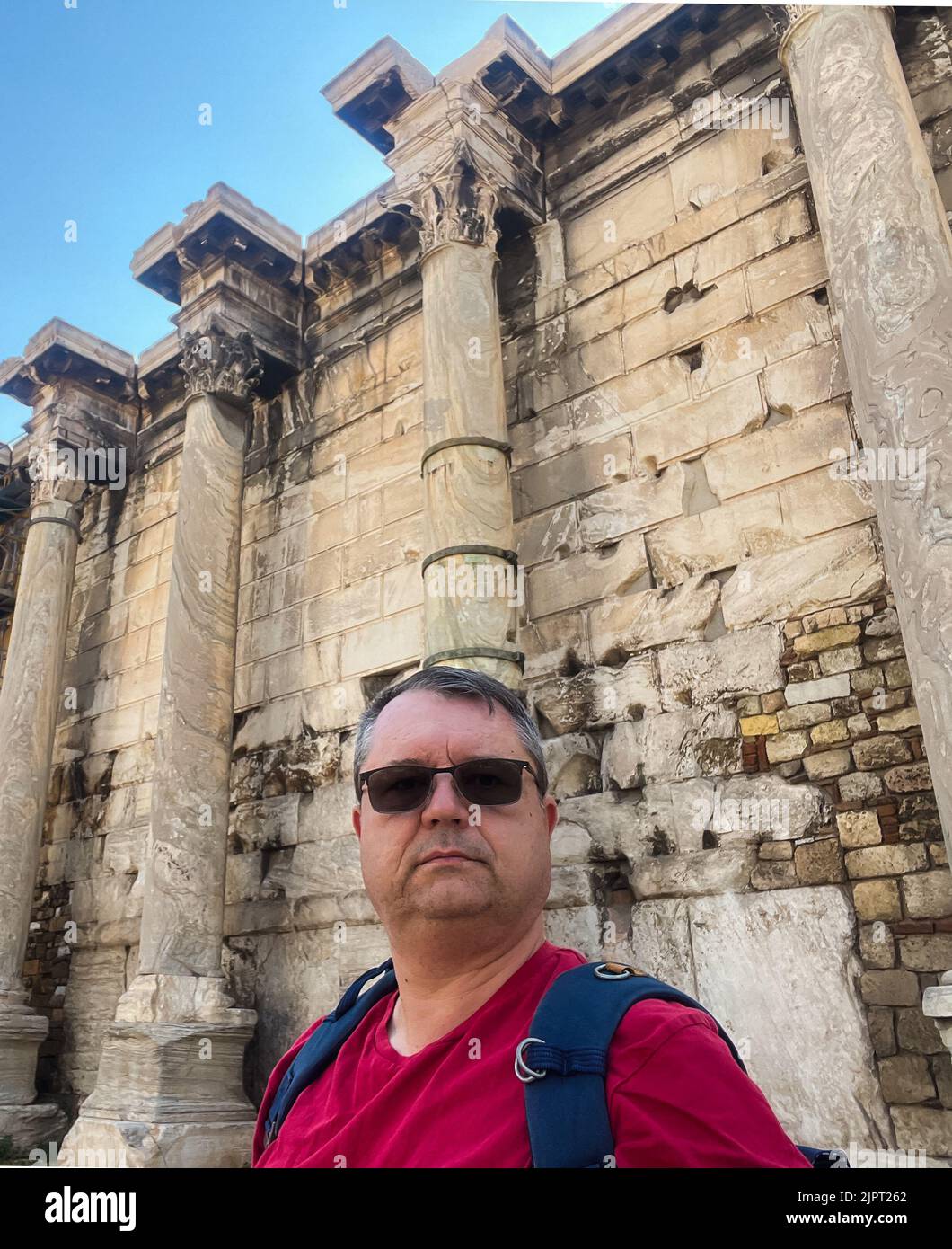 Male tourist near Hadrian's library. This is one of the main ...