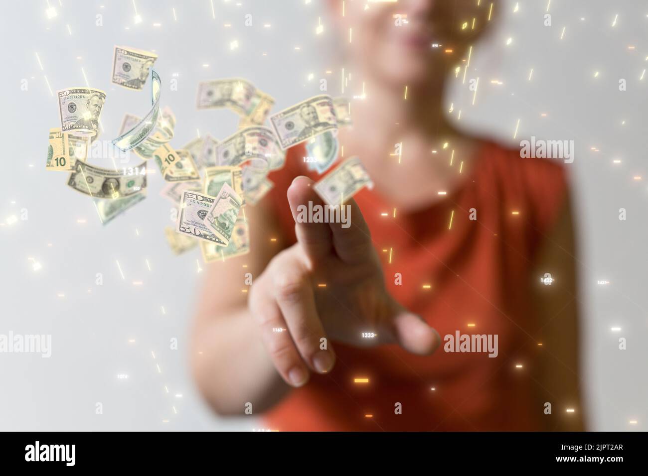 A woman tapping a floating 3D rendered money icons Stock Photo - Alamy