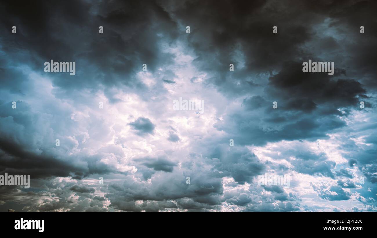 Clouds Illuminated By Sun Move Rapidly Across Sky. Colorful Cloudy Blue ...